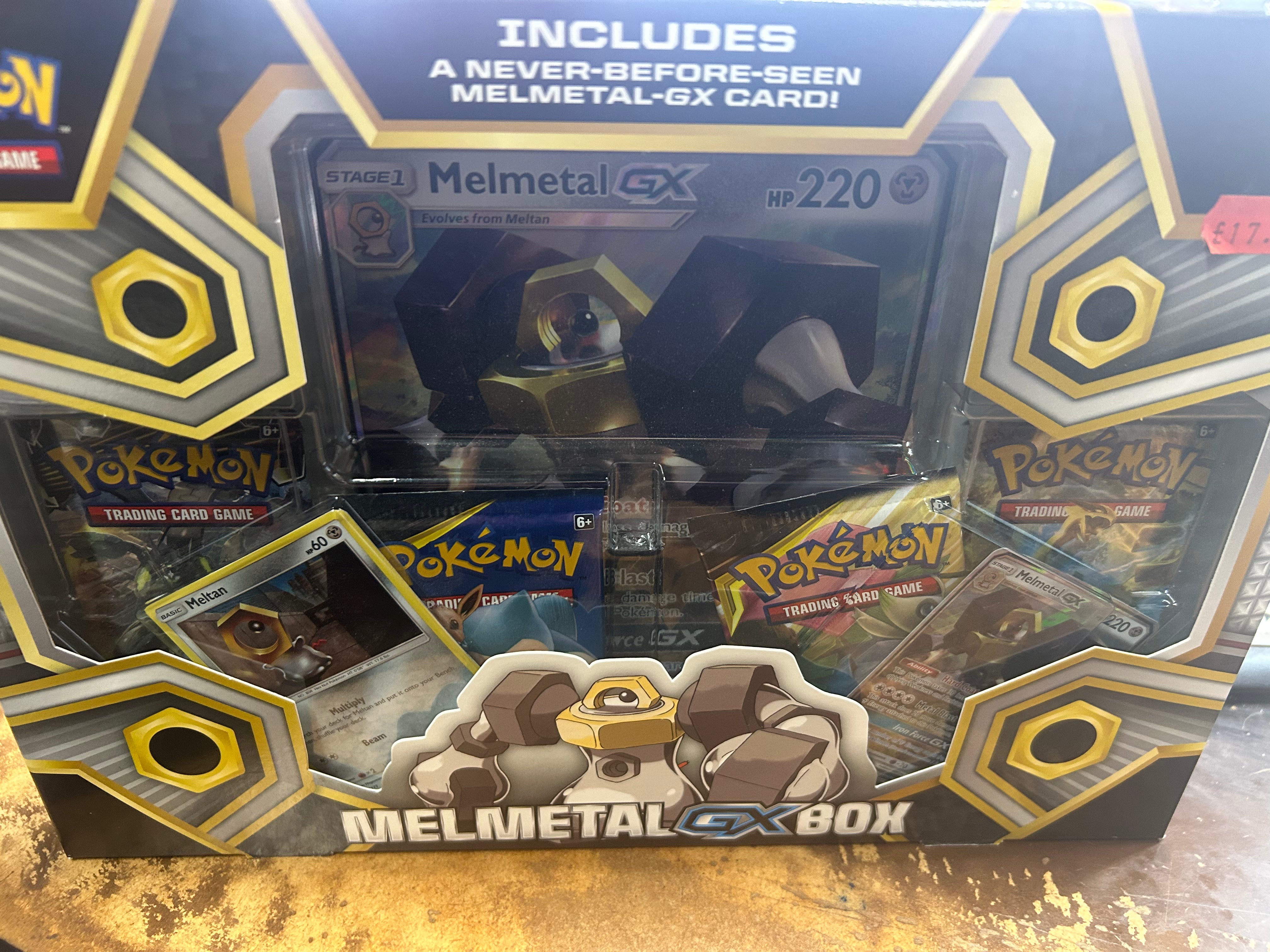 MELMETAL GX BOX. W/2 TEAM UP – TPV POKE CENTER